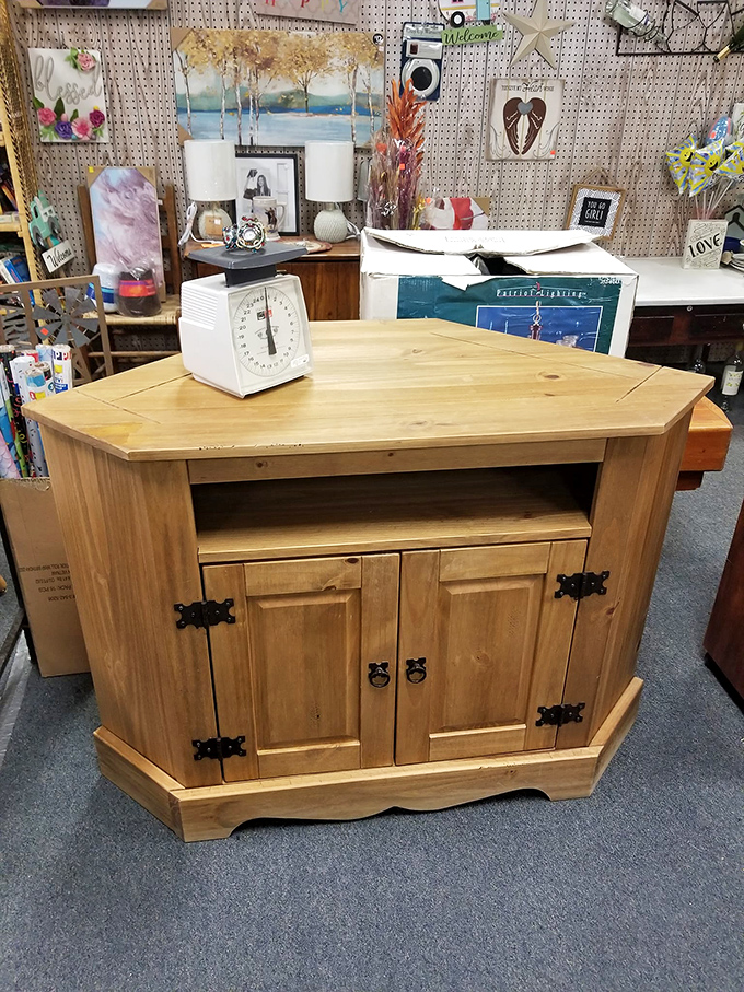 This solid pine entertainment center is patiently waiting for someone to realize it could become the perfect kitchen island with minimal DIY.