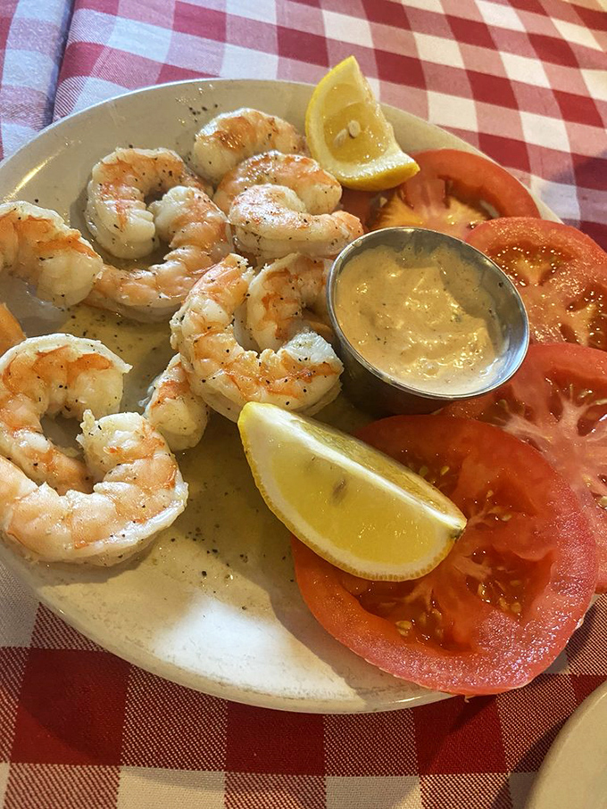Perfectly grilled shrimp arranged like an edible clock face, ready to disappear faster than your resolutions on New Year's Day.