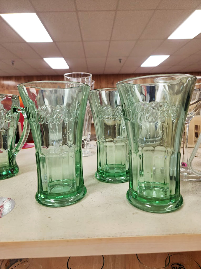Vintage Coca-Cola glasses in that distinctive green—perfect for serving up nostalgia alongside your sweet tea or something stronger.