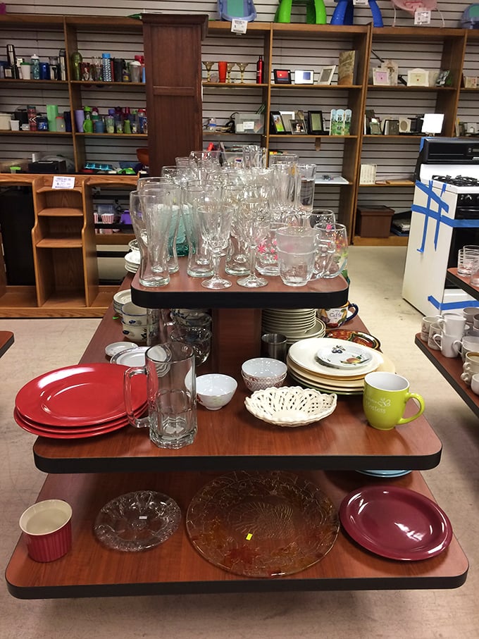 Glassware galore! From everyday juice glasses to crystal that's ready for its champagne toast comeback, all arranged like a transparent cityscape.
