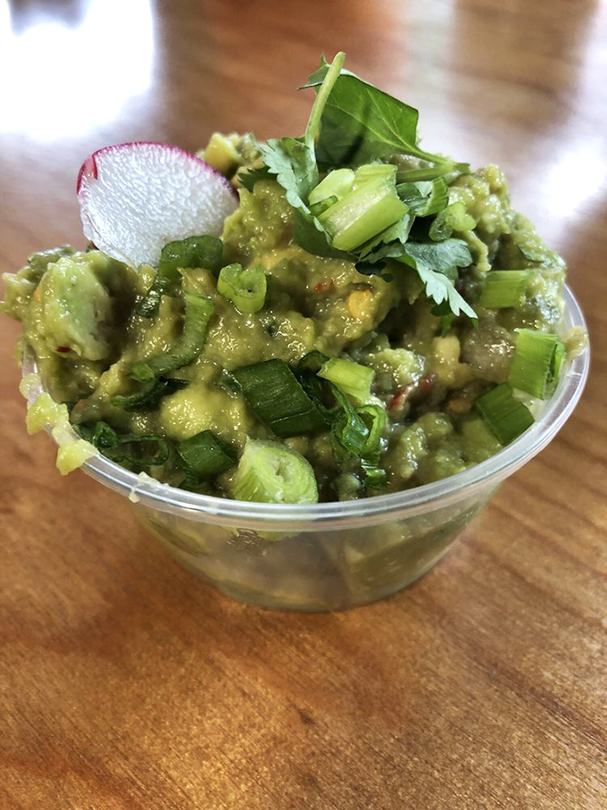 This isn't just guacamole&mdash;it's a green masterpiece of texture and freshness that makes store-bought versions weep with inadequacy.