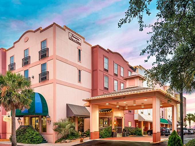 Pink isn't just a color here, it's an entire hospitality philosophy. This Hampton Inn dressed up for a perpetual Florida sunset.