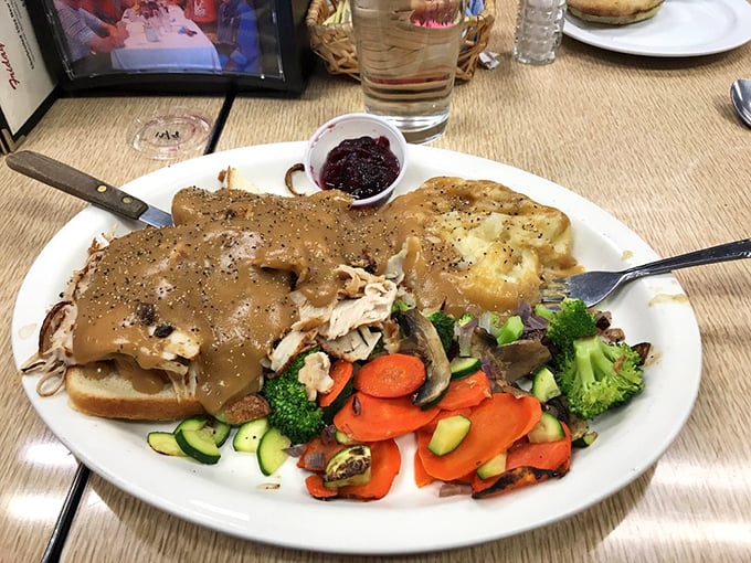 This hot turkey sandwich doesn't just come with gravy&mdash;it comes with a flood of gravy that turns your plate into a delicious archipelago.