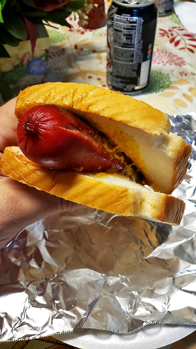 A different kind of barbecue treasure. The smoke-infused hot link nestled in pillowy bread offers a spicy counterpoint to the pulled pork classics.