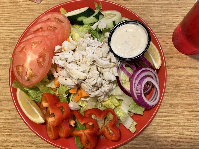 Even their salads show seafood respect. Fresh crab meat takes center stage among crisp vegetables and bright colors.
