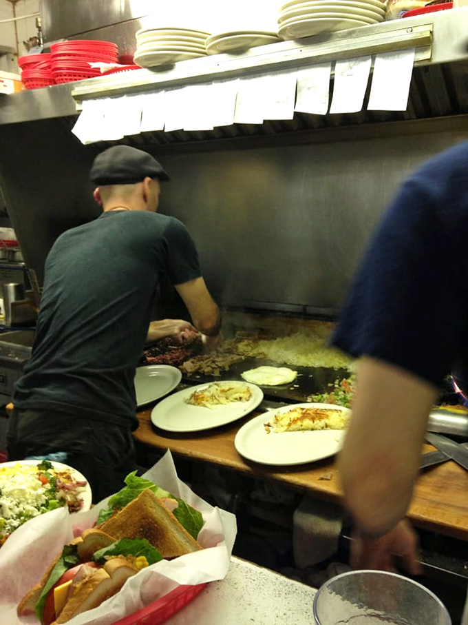 The open kitchen ballet&mdash;where short-order cooks perform culinary choreography that would make Baryshnikov jealous.