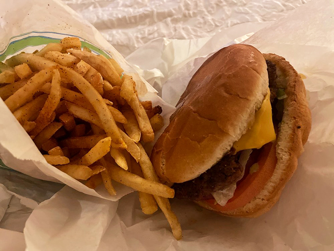 Simple pleasures done right: golden fries with just the right amount of salt and a cheeseburger that makes fast food chains weep with inadequacy.