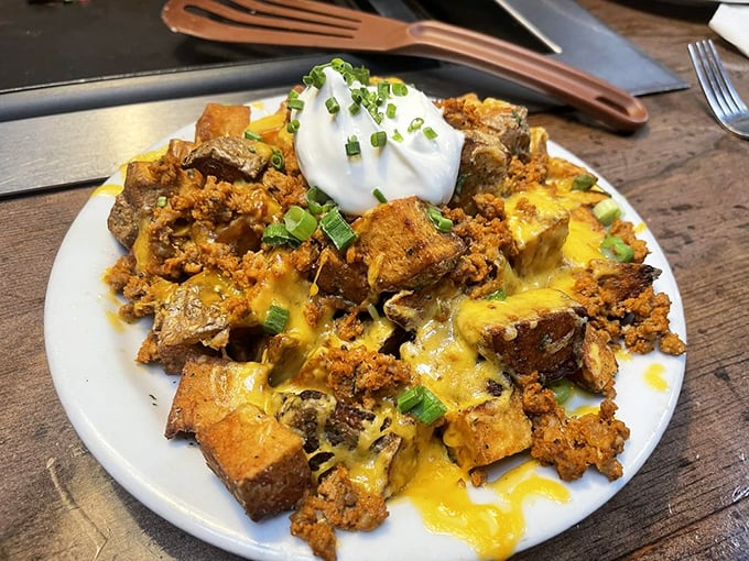 Loaded potatoes that didn't just get dressed—they put on their Sunday best with melted cheese, green onions and a poached egg crown.