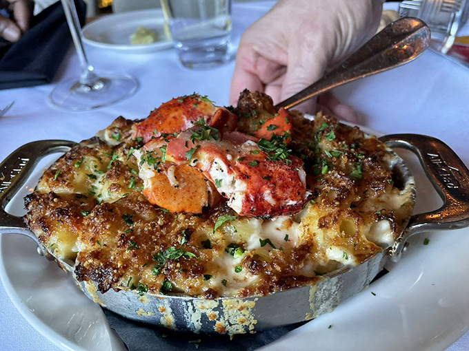 The lobster mac and cheese arrives like a celebrity&mdash;commanding attention, inspiring photos, and making nearby tables jealous.