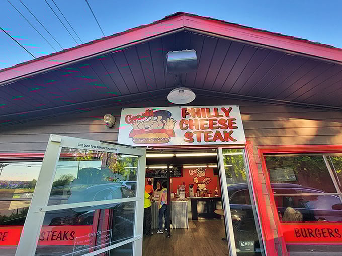 The cartoon sandwich guy on the sign looks as happy as you'll be after your first bite. He knows what's up.
