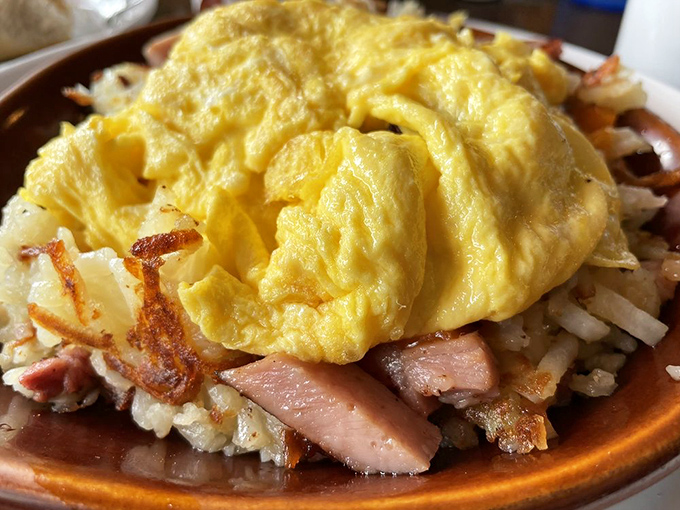 This skillet doesn't just contain breakfast&mdash;it showcases a perfect marriage of crispy potatoes, savory ham, and eggs that practically glow with goodness.