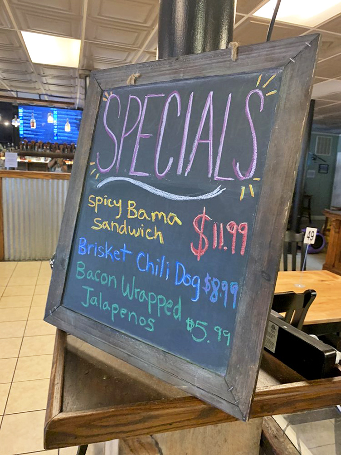 This specials board isn't just announcing food&mdash;it's revealing today's opportunities for joy. That Spicy Bama Sandwich is practically begging for attention.