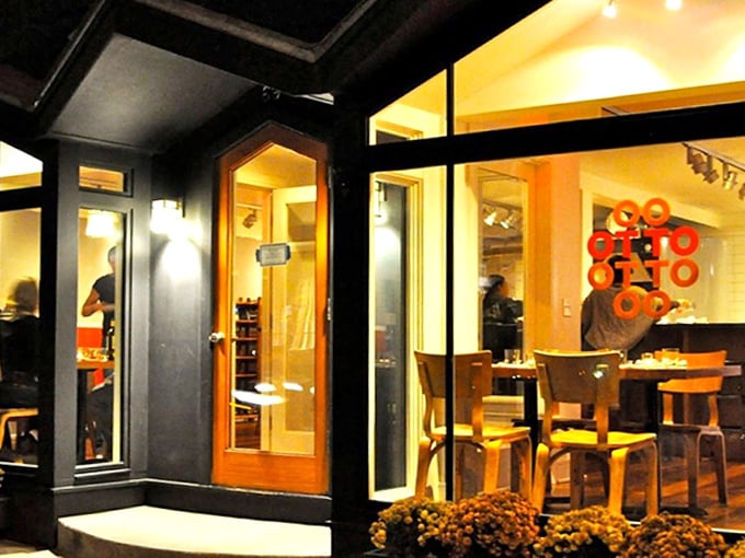 Glowing lights and modern wood accents create a perfect atmosphere for you to enjoy a delicious meal with great company.