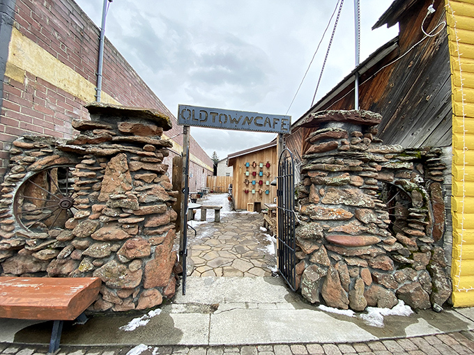 The Old Town Cafe's stone entrance feels like stepping through a portal to comfort food&mdash;those rock pillars have witnessed countless breakfast debates.