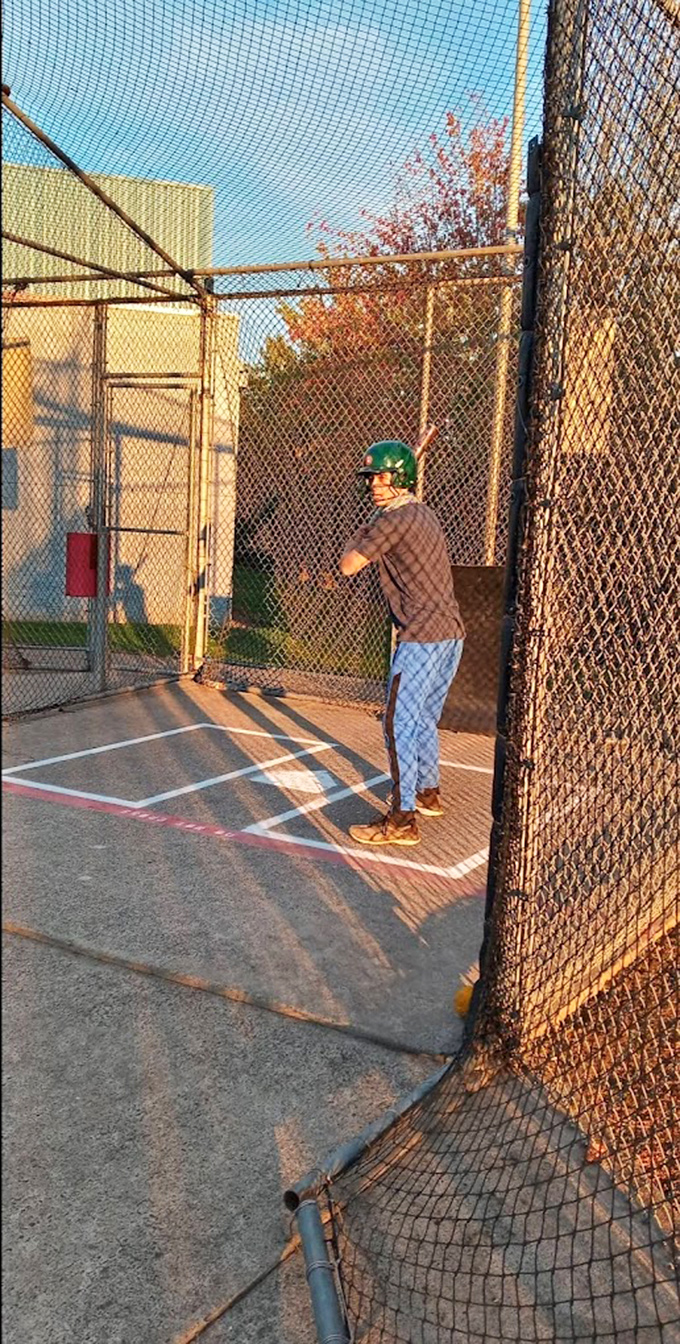 The batting cage&mdash;where baseball dreams and reality collide in a chain-link reminder that you're not quite MLB material.