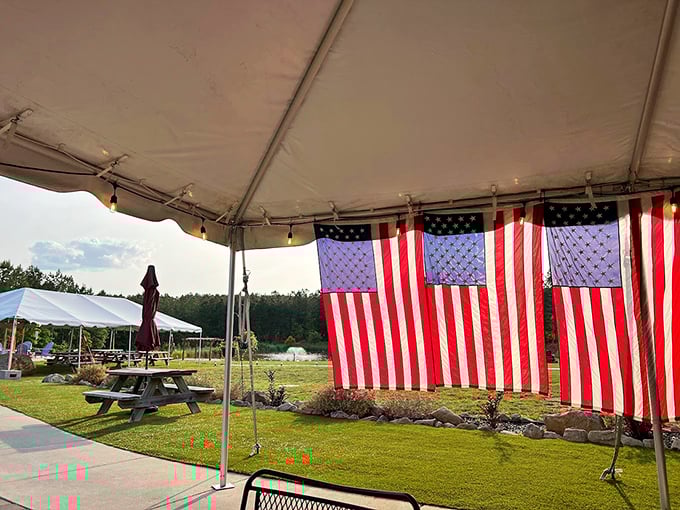 American flags flutter in the breeze as if to say, "This, my friends, is what we mean by amber waves of grain-fed beef."