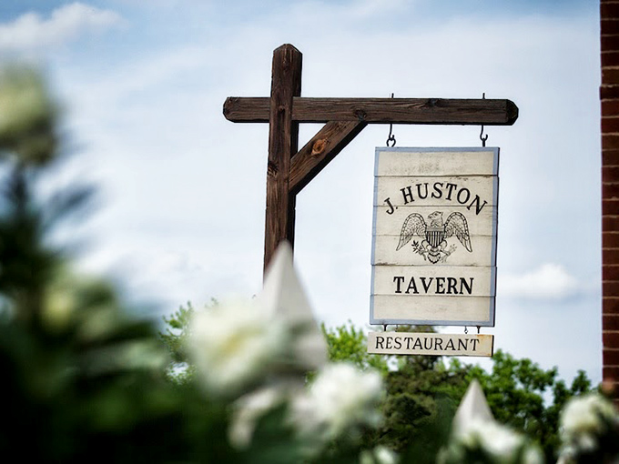 The tavern's iconic sign swings gently in the Missouri breeze, beckoning hungry travelers just as it has since Andrew Jackson was president.