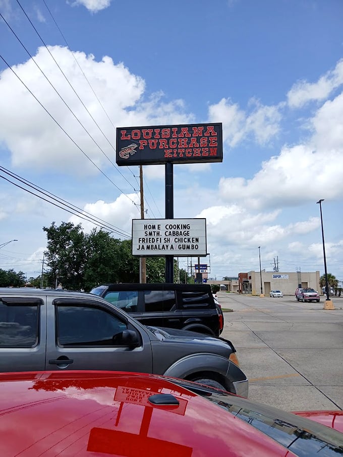 The marquee announces its specialties without pretense. No false advertising here &ndash; just a straightforward promise of satisfaction.