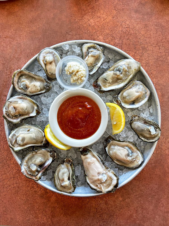 These oysters arrive at your table looking like jewelry on ice – briny, fresh treasures that defy Oklahoma's landlocked geography.