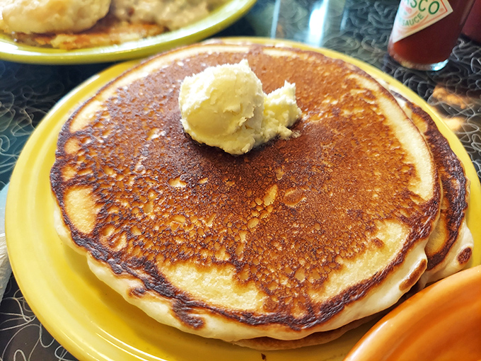 This isn't just a pancake&mdash;it's a golden disk of happiness with a melting pat of butter that's basically performing a swan dive into breakfast paradise.