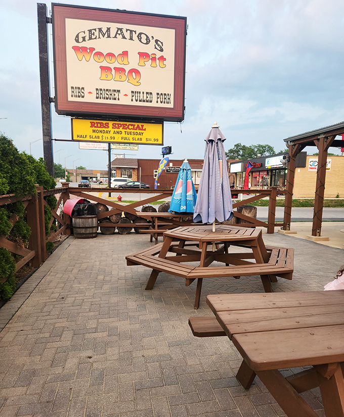 The outdoor patio where summer dreams and BBQ steam mingle under Illinois skies. Those picnic tables have heard more satisfied sighs than a therapist's couch.