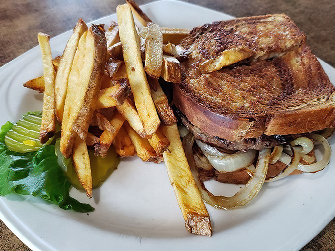 The patty melt&mdash;where grilled onions, melted cheese, and beef unite on grilled bread to form the holy trinity of diner perfection.