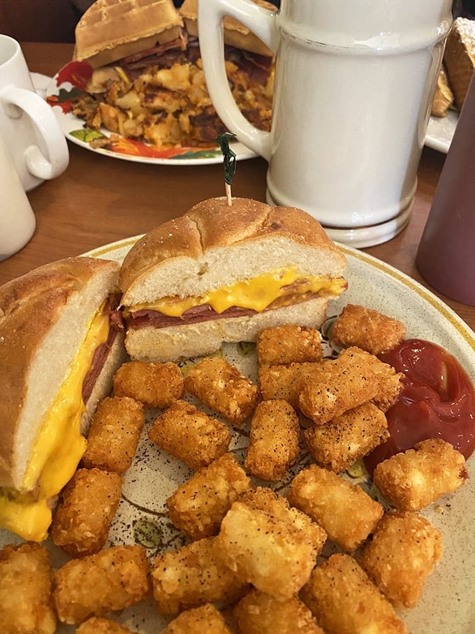 The holy trinity of Jersey breakfast: pork roll, egg, and cheese, with golden tater tots standing guard. Born to run straight to your stomach.