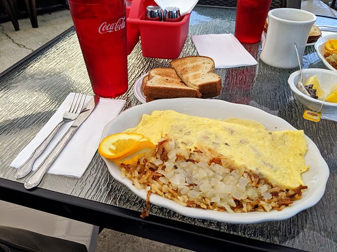An omelet that spans the entire plate, with toast standing by for backup. This isn't just breakfast&mdash;it's breakfast with ambition.