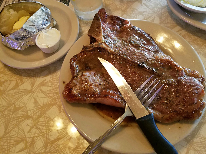 The T-bone steak arrives like a meaty monument to excess. The knife isn't just a utensil&mdash;it's your ticket to a century-old tradition.