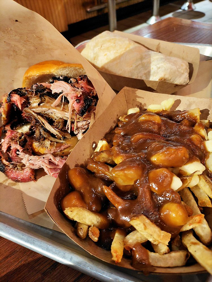 Poutine gets the smokehouse treatment. French fries swimming in gravy with a pulled pork sidekick&mdash;a beautiful international alliance.