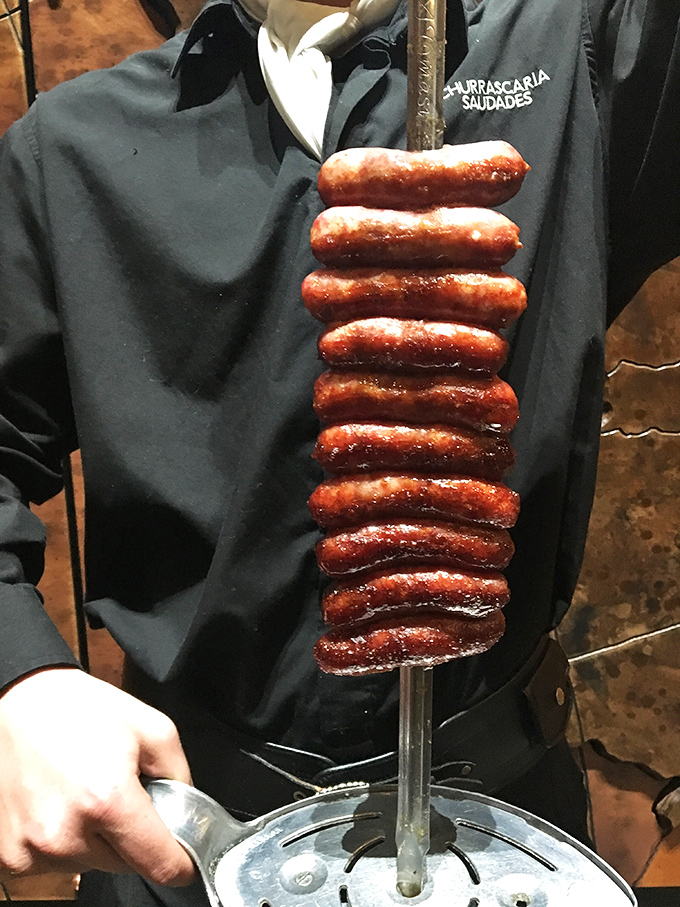 Sausages stacked like delicious poker chips, ready to be wagered on your appetite. The house always wins, but so does your stomach.