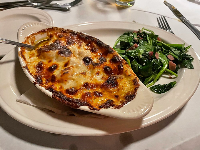 This seafood au gratin isn't just comfort food—it's a warm hug in a ceramic dish, topped with a perfectly browned crust.