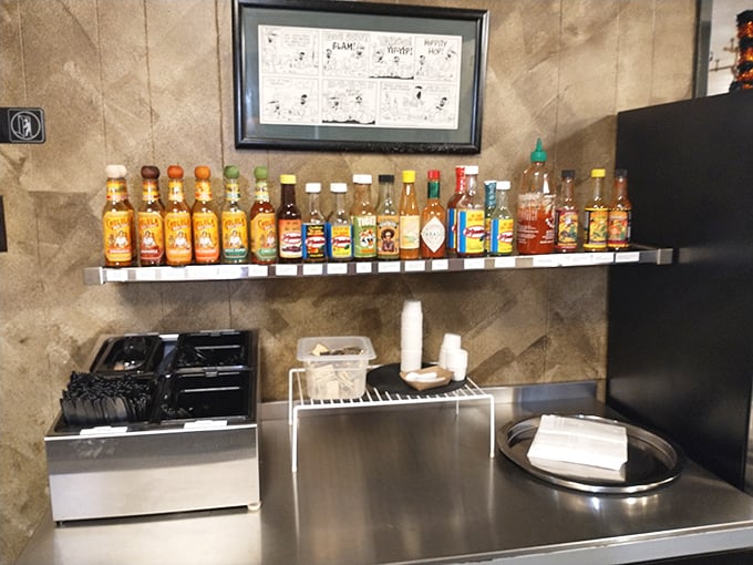 Hot sauce heaven for the heat-seekers. This shelf isn't decoration&mdash;it's a carefully curated collection of liquid fire for the brave and adventurous.