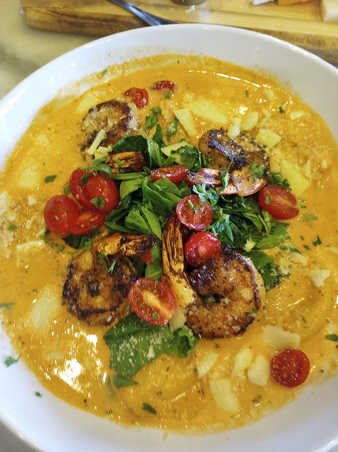 This isn't just shrimp and grits &ndash; it's a Southern hug in a bowl, with cherry tomatoes providing perfectly timed bursts of acidic brilliance.