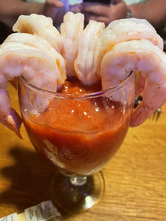 Shrimp cocktail perched on a glass like synchronized swimmers diving into spicy sauce&mdash;a classic appetizer that never goes out of style.
