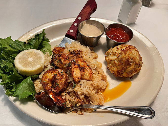 Spiced shrimp nestled on a bed of rice with a crab cake standing guard. In Maryland, seafood isn't just food &ndash; it's practically a constitutional right.