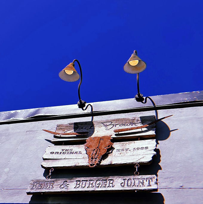 That longhorn skull sends a clear message: serious beef business happens here. No salad bars or "diet options" need apply.