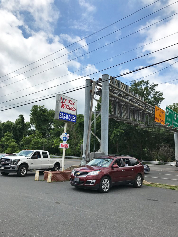 The roadside beacon that signals salvation for hungry travelers. That vintage sign has guided food pilgrims to burger nirvana for decades.