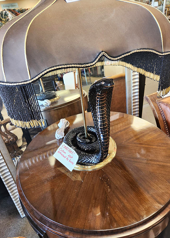 "Is that a cobra lamp or are you just happy to see me?" Conversation pieces like this are why thrift stores beat big box retailers every time.
