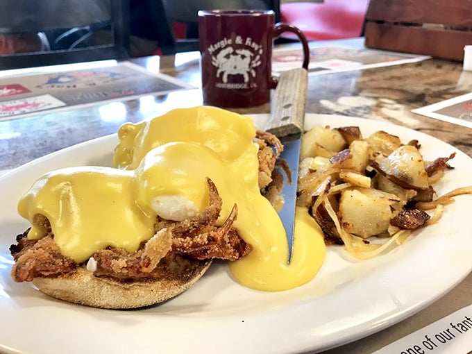 Soft shell crab Benedict&mdash;where breakfast meets the bay. That hollandaise sauce is performing a love song to the crab beneath it.