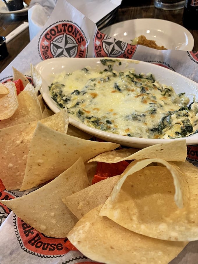 Spinach artichoke dip: where vegetables go to be forgiven for being healthy. The melted cheese is their redemption story.