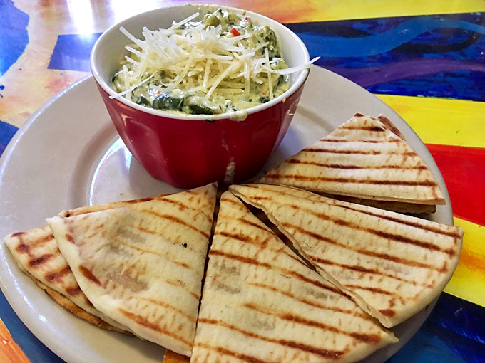 Quesadillas with a side of attitude! Grilled to perfection and paired with a vibrant salad that pops with color and flavor.