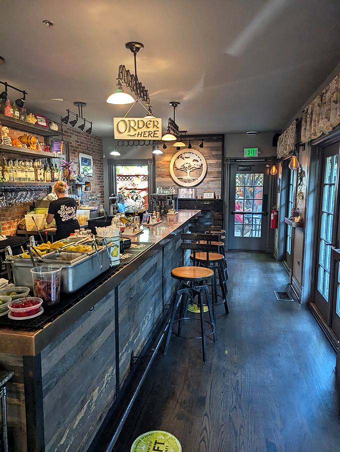 The bar area's "Order Here" sign might as well say "Happiness Begins Here"&mdash;a portal to Southern libations and hospitality.