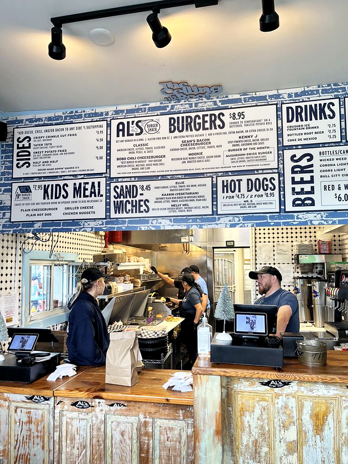 The orchestrators of joy working their burger magic behind the counter. These aren't just cooks&mdash;they're happiness engineers.
