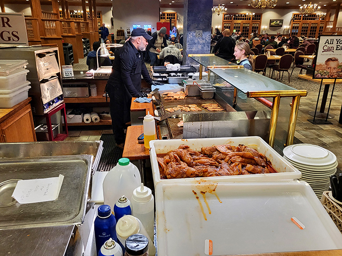 Where the magic happens—dedicated staff ensuring the buffet remains abundantly stocked for the parade of hungry customers on their fourth trip around.