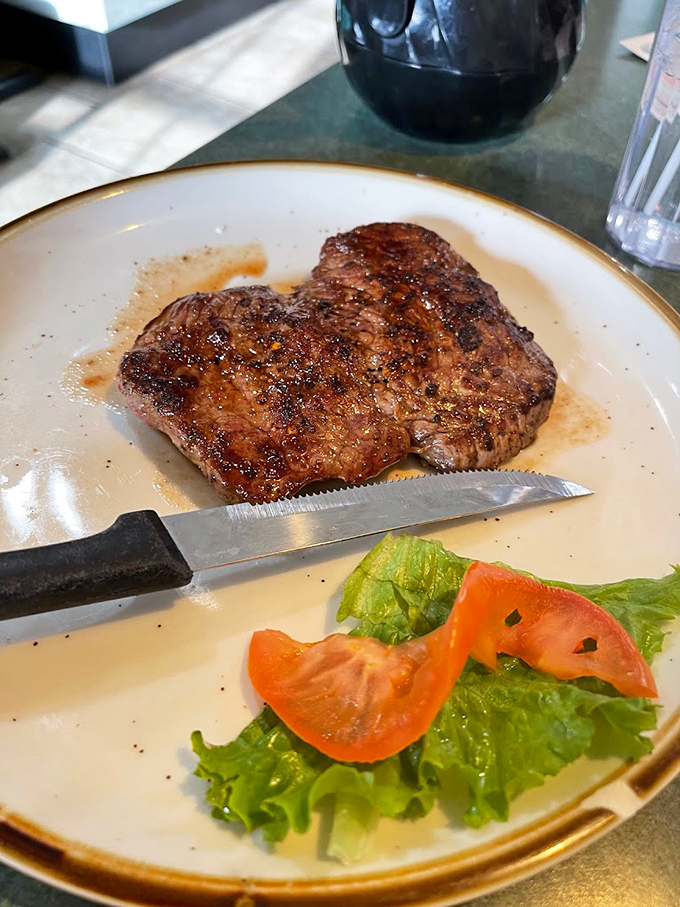 A steak cooked with the respect it deserves&mdash;simple seasoning, perfect sear, and just enough garnish to brighten the plate without distracting from the main event.