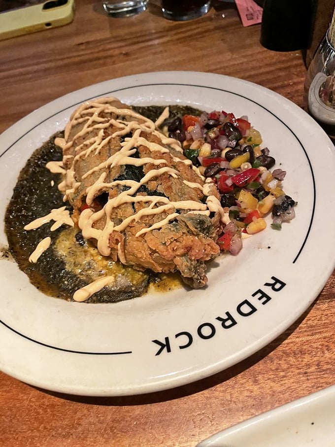 This stuffed poblano isn't just dinner&mdash;it's edible architecture. The drizzle of sauce on top is like the artist's signature on a masterpiece.