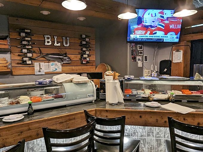 Sushi Counter: Where the magic happens&mdash;part kitchen, part theater, with the Blu logo watching over proceedings like a seafood guardian angel.