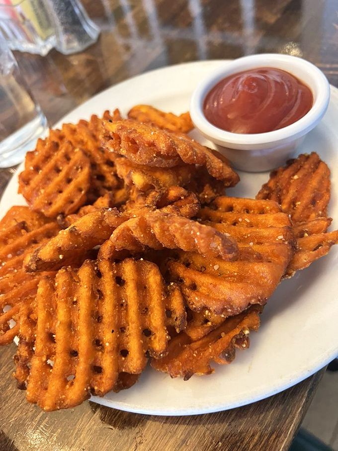 Sweet potato waffle fries: proof that vegetables can have more fun than anyone at the party. Crispy, orange, and impossible to eat just one.