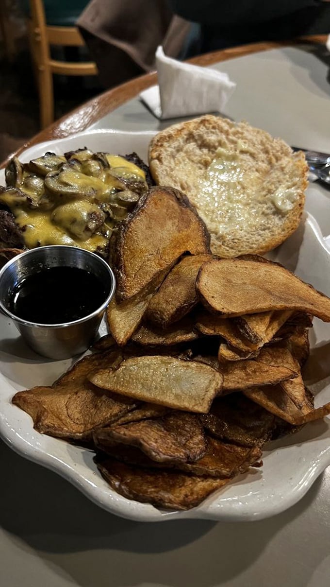 Homemade potato chips surround a burger with melted cheese that's having an identity crisis&mdash;is it breakfast or lunch? Who cares when it looks this good.